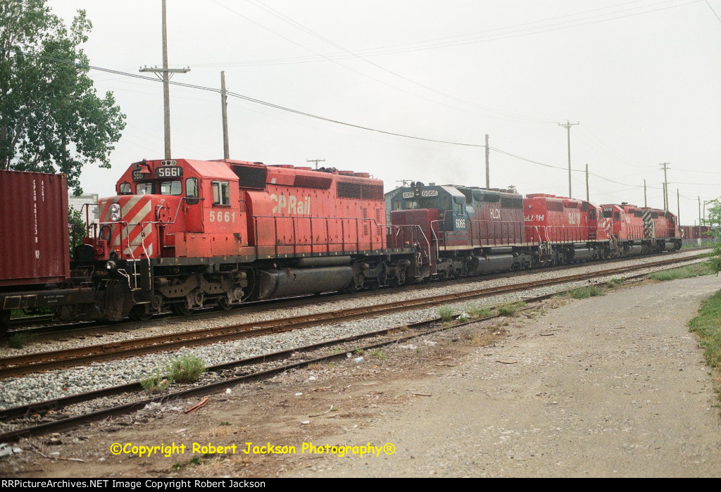 SEQUENCE SHOT #4--CP Rail train with five SD40-2 type locos!